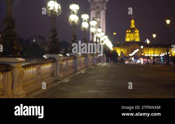 Bokeh shot of Les Invalides across the Pont Alexandre III bridge in ...