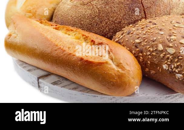 Breads and baked goods: Camera pans across large assortment in HD video ...