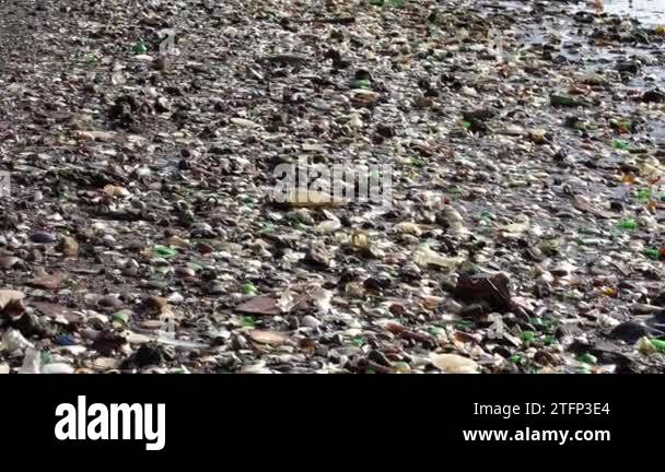 Extremely polluted Beach on Atlantic Ocean. Trash, Rubbish and waste ...