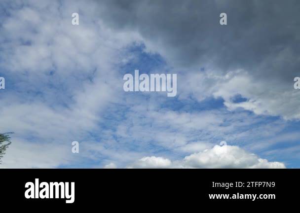 Formation of clouds in the sky. Movement of air masses. The change of ...