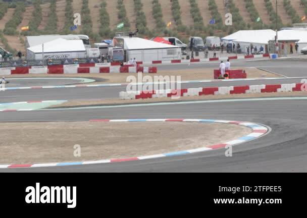 Karts running in a curve karting circuit race Stock Video Footage - Alamy