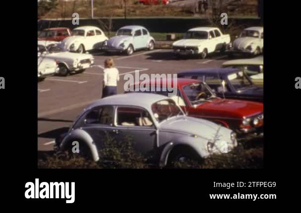 Amsterdam, Netherlands may 1969: Car parking scene in 60s Stock Video ...