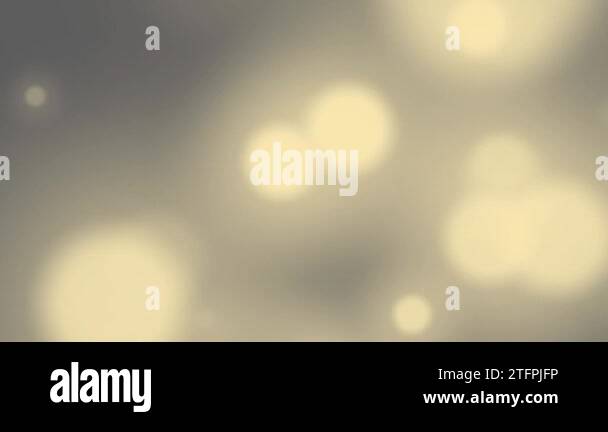 Animation of falling spots of lights over grey background. color ...