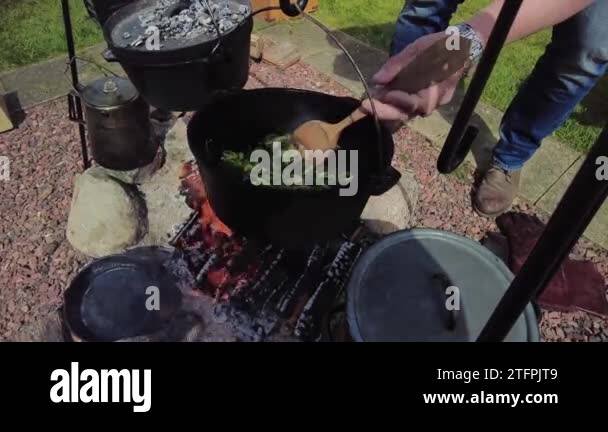 Cooking outdoors food preparation Stock Videos & Footage - HD and 4K ...