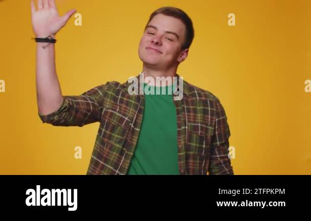 Come here, join us. Welcome. Handsome teenager man showing inviting ...