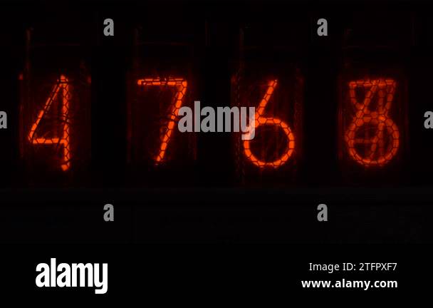 Retro vacuum tube display on the device counts seconds. Displaying ...