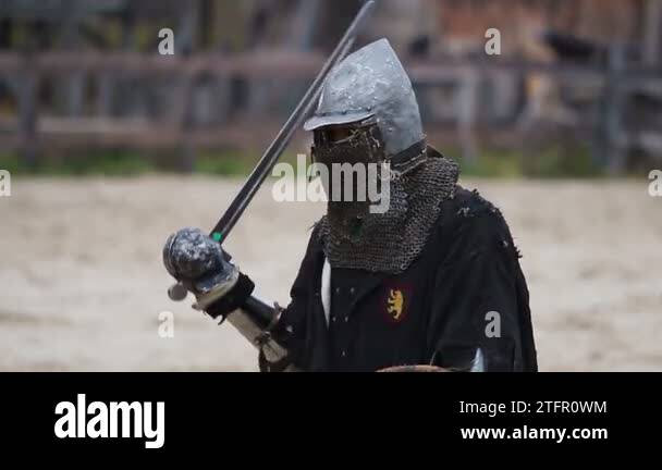 Enemy calling out knight for a fight. Historical reenactment of ...