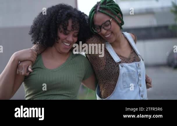 Two happy black Brazilian women celebrating life together. South ...