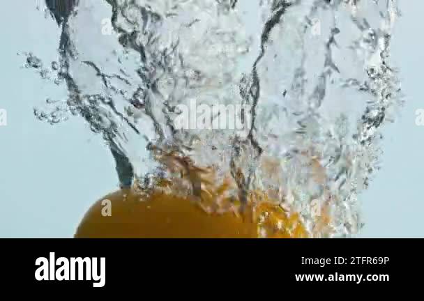 Sweet pepper drop water in light background closeup. Fresh yellow ...