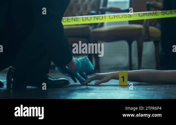 Detective Collecting Evidence in a Crime Scene. Forensic Specialists ...