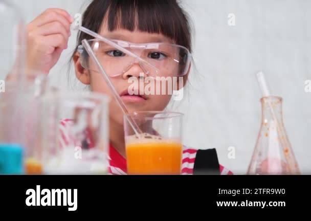Children are learning and doing science experiments in the classroom ...