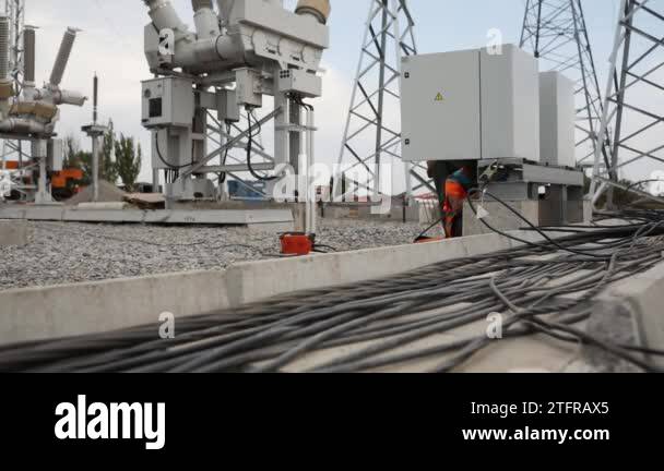 High-voltage cables in concrete duct at construction site Stock Video ...