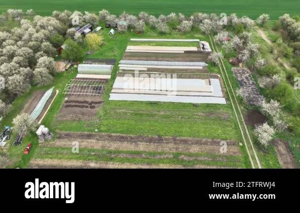 Farm bio farming agricultural garden farmer fruit tree drone aerial ...