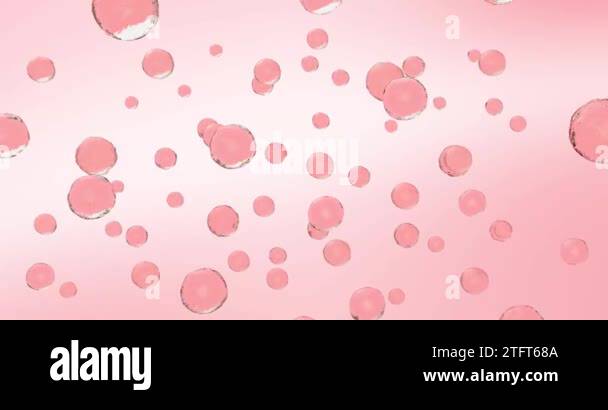 Macro shot of various serum bubbles in air rising up on light pink ...