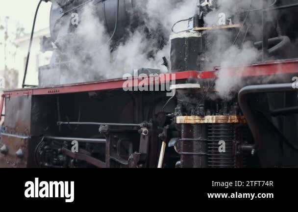 Vintage steam train locomotive. Pair locomotive train leaking smoke ...