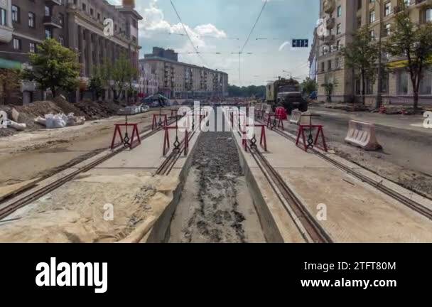 Tram rails at the final stage of their installation and integration ...