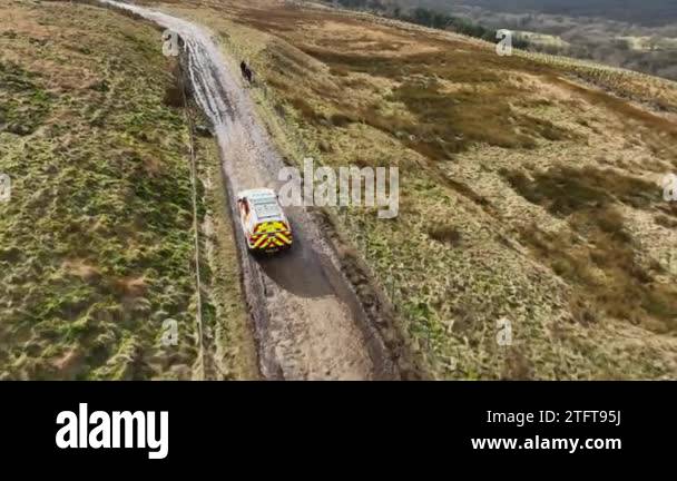 Mountain Rescue Ambulance Vehicles Driving Across Rugged Terrain Stock ...