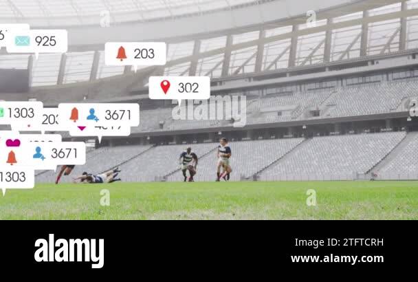 Animation of media icons over diverse male rugby players playing at ...