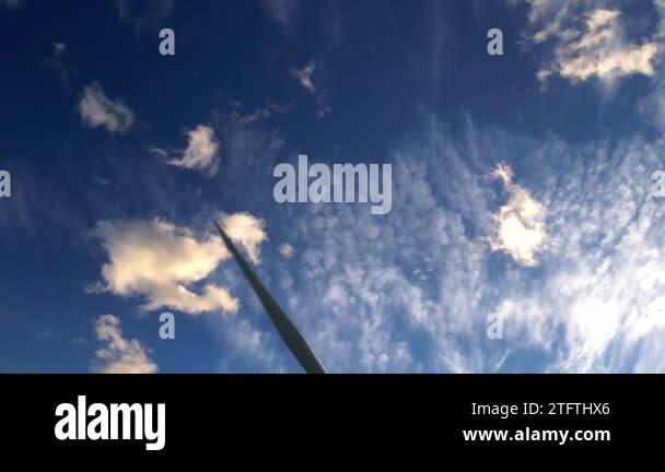 Wind turbines during sunrise. Wind farm generating green energy in the ...