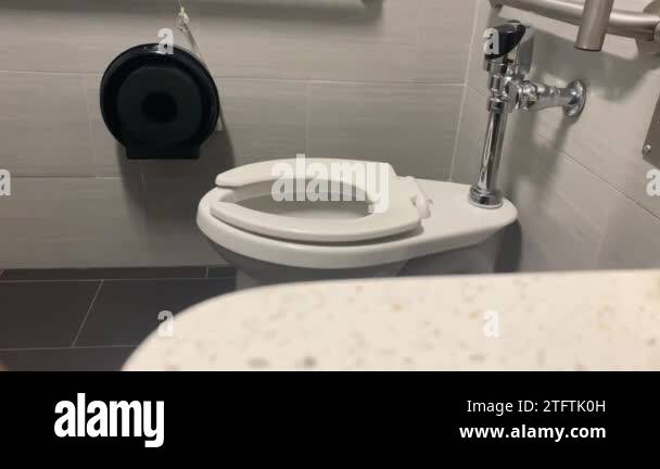 hospital or doctor's office bathroom with a fresh urine sample on the ...