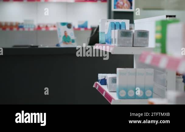 Empty pharmacy store with containers and packages on medicaments ...