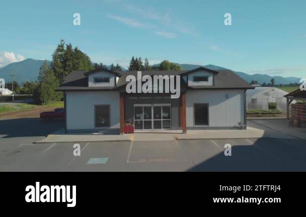 Local Harvest Market and farm store front aerial from parking lot ...