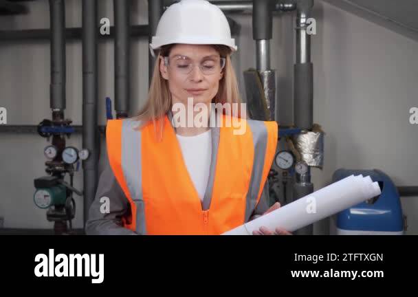 Confident female construction worker is holding her hard hat Stock Videos & Footage - HD and 4K ...