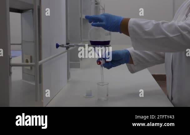 Separating funnel laboratory glassware used in liquid-liquid ...