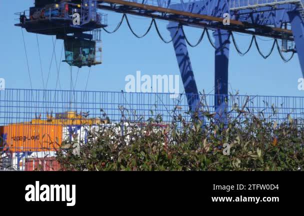 Shipping container crane lift loading heavy cargo shipyard shipment ...