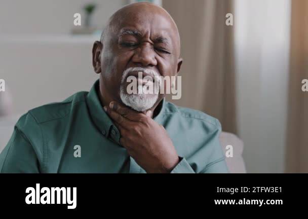 Sick African old man suffer from sore throat painful tonsillitis ...