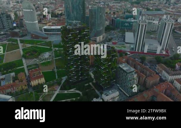 Modern high rise apartment building covered with garden, TreeVilla park ...