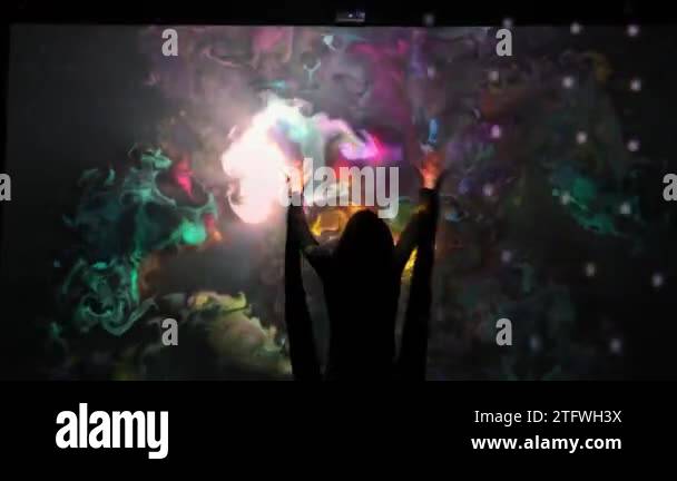 Girl plays with interactive video installation, New art form ...