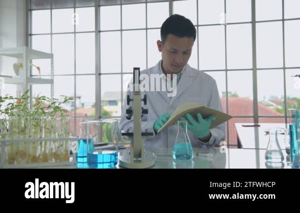 Research concept of 4k resolution. Asian scientists are searching for ...