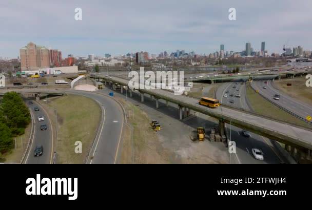 Tracking of yellow school bus passing on long elevated exit ramp of ...