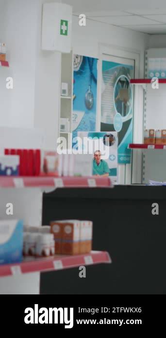 Vertical video: Empty pharmacy retail store with medicaments and ...