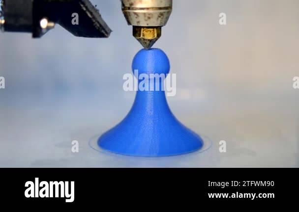 3D printer in operation close-up. Automatic three dimensional 3d ...