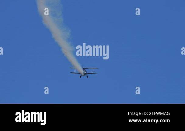 Padua, Italy JUNE, 26, 2022 Acrobatic airplane performs a half Cuban ...