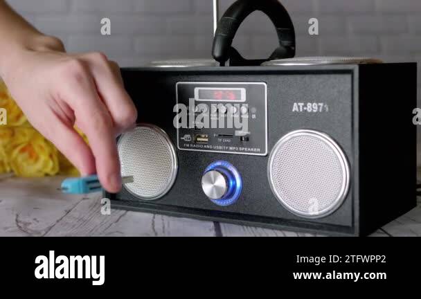 Female Hands Connecting a USB Flash Drive to the Connector of a Radio ...