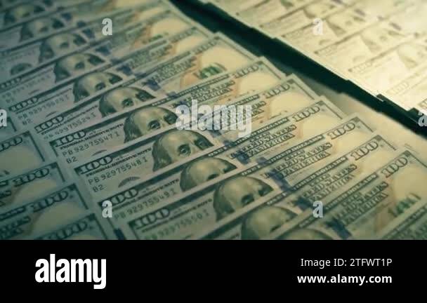 A lot of money, dollars in denominations of 100 banknotes. Millions lie ...