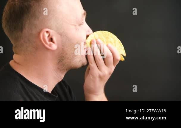 Hispanic man eating taco Stock Videos & Footage - HD and 4K Video Clips ...