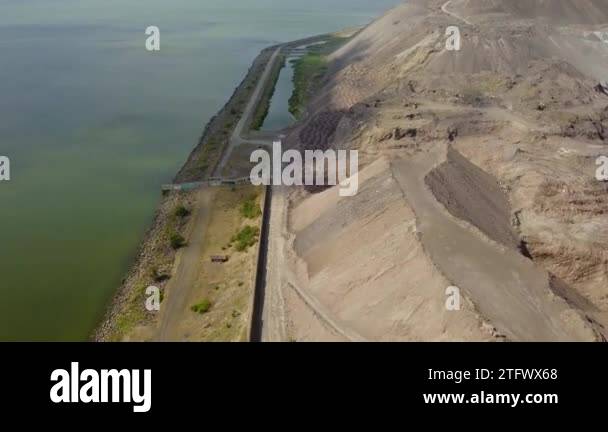 Aerial of metallurgical plants slag, scrap dump heap from metallurgical ...