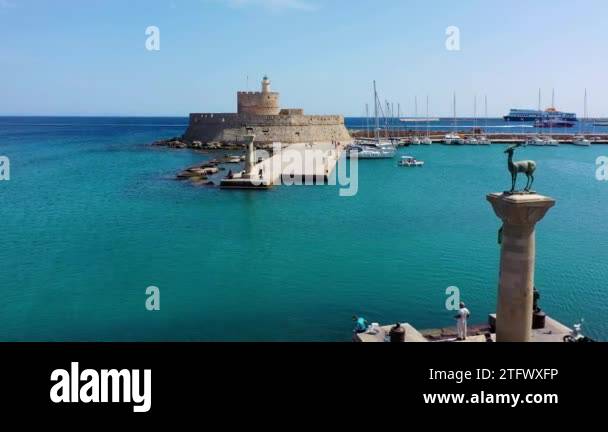 Mandraki port with deers statue, where The Colossus was standing and ...