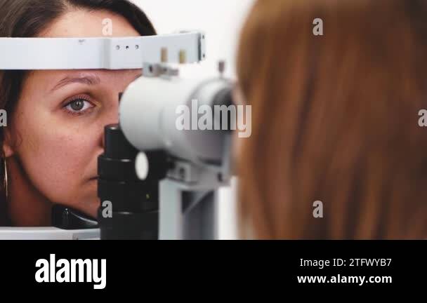 Eye test for visual acuity. The patient receives eye consultation Stock ...