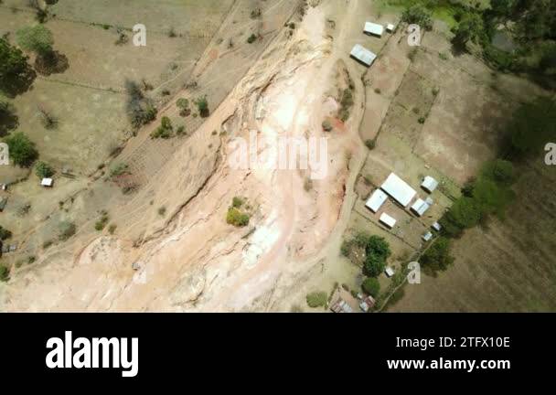 Tilting drone flight of busy local market in tribal village of ...