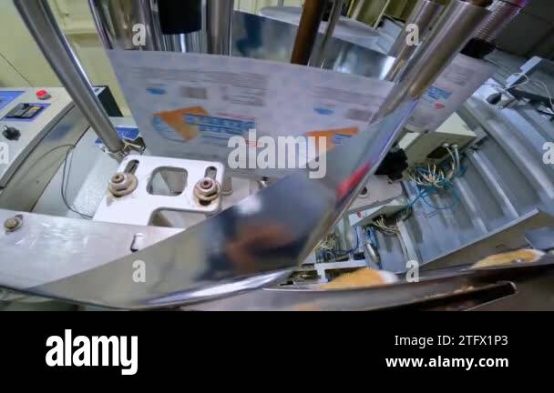 A modern conveyor for the production of ice cream. Ice cream production ...