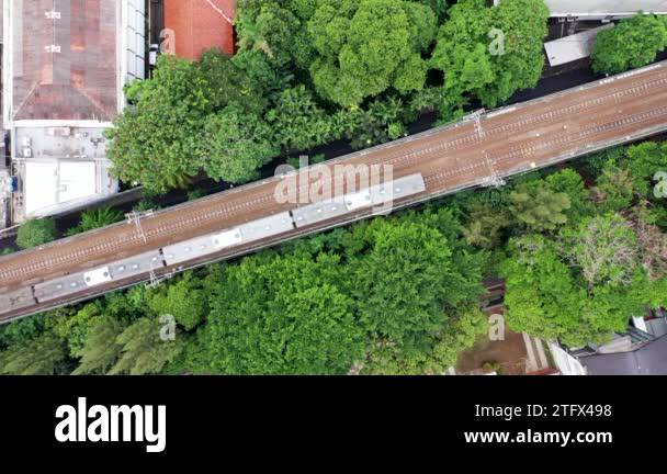 Top down view of new LRT train on the elevated track. Shot in 4k ...