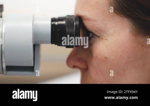 Eye test for visual acuity. The patient receives eye consultation Stock ...