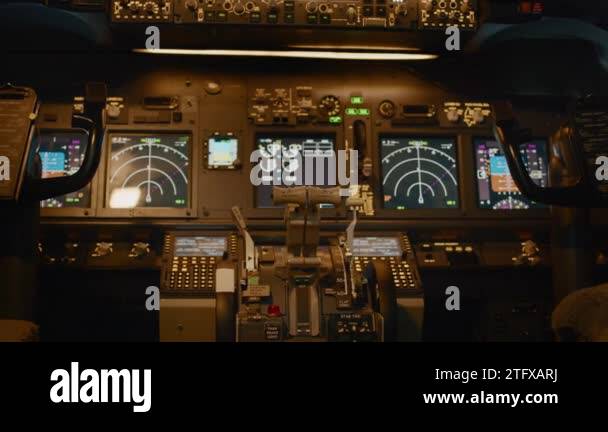 Empty airplane cockpit with dashboard navigation to takeoff Stock Video ...