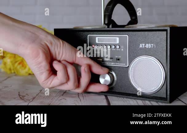 Female Hands Pressing Buttons, Rotates Handle on a Portable Audio Tape ...