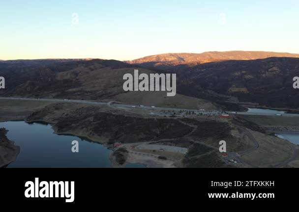 Cars travel on interstate 5 next to Pyramid Lake on the Tejon Pass ...